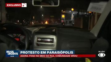 Carro de reportagem do Brasil Urgente é cercado em Paraisópolis